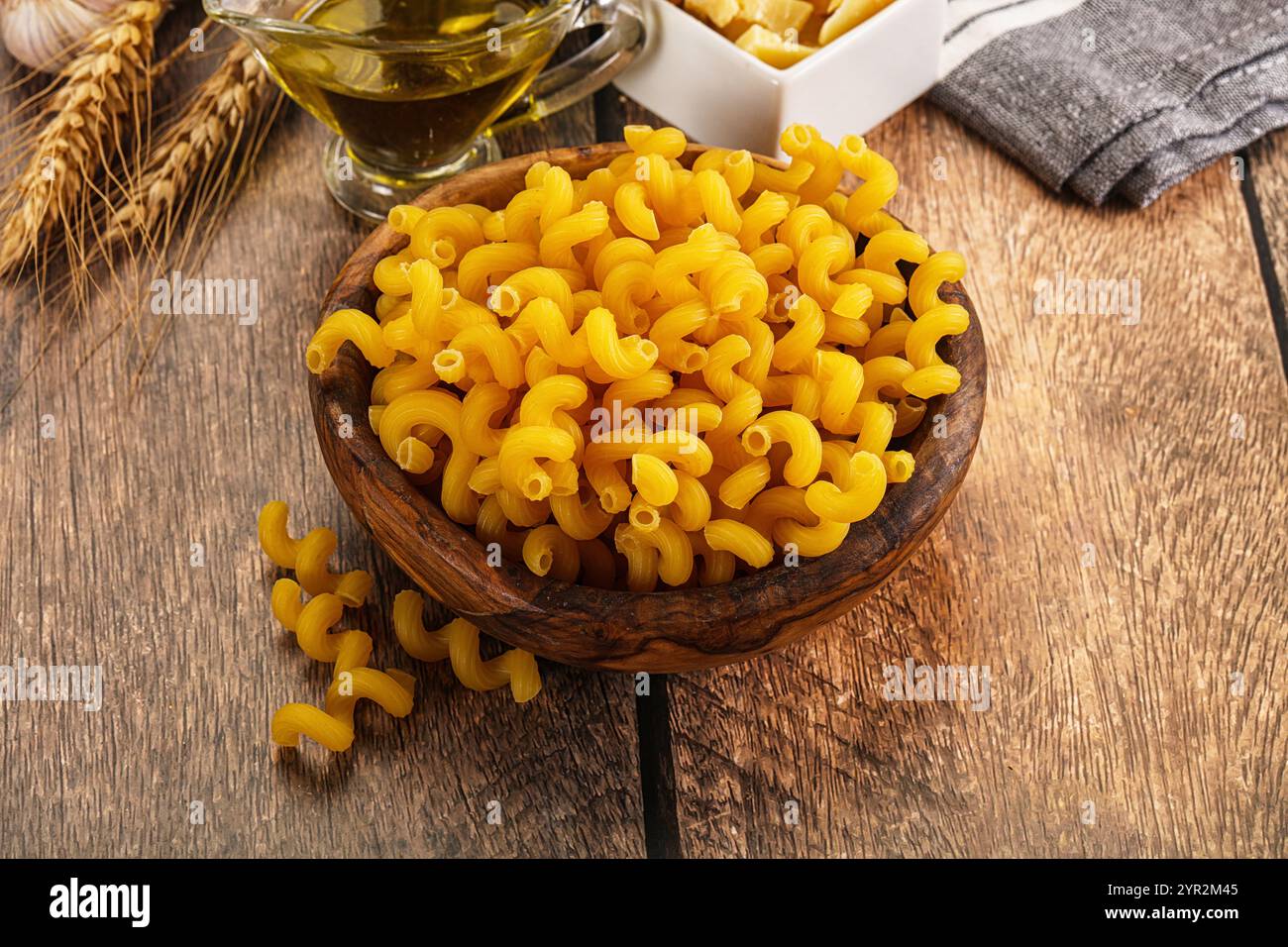 Italian cuisine - dry cellentani pasta for cooking Stock Photo - Alamy