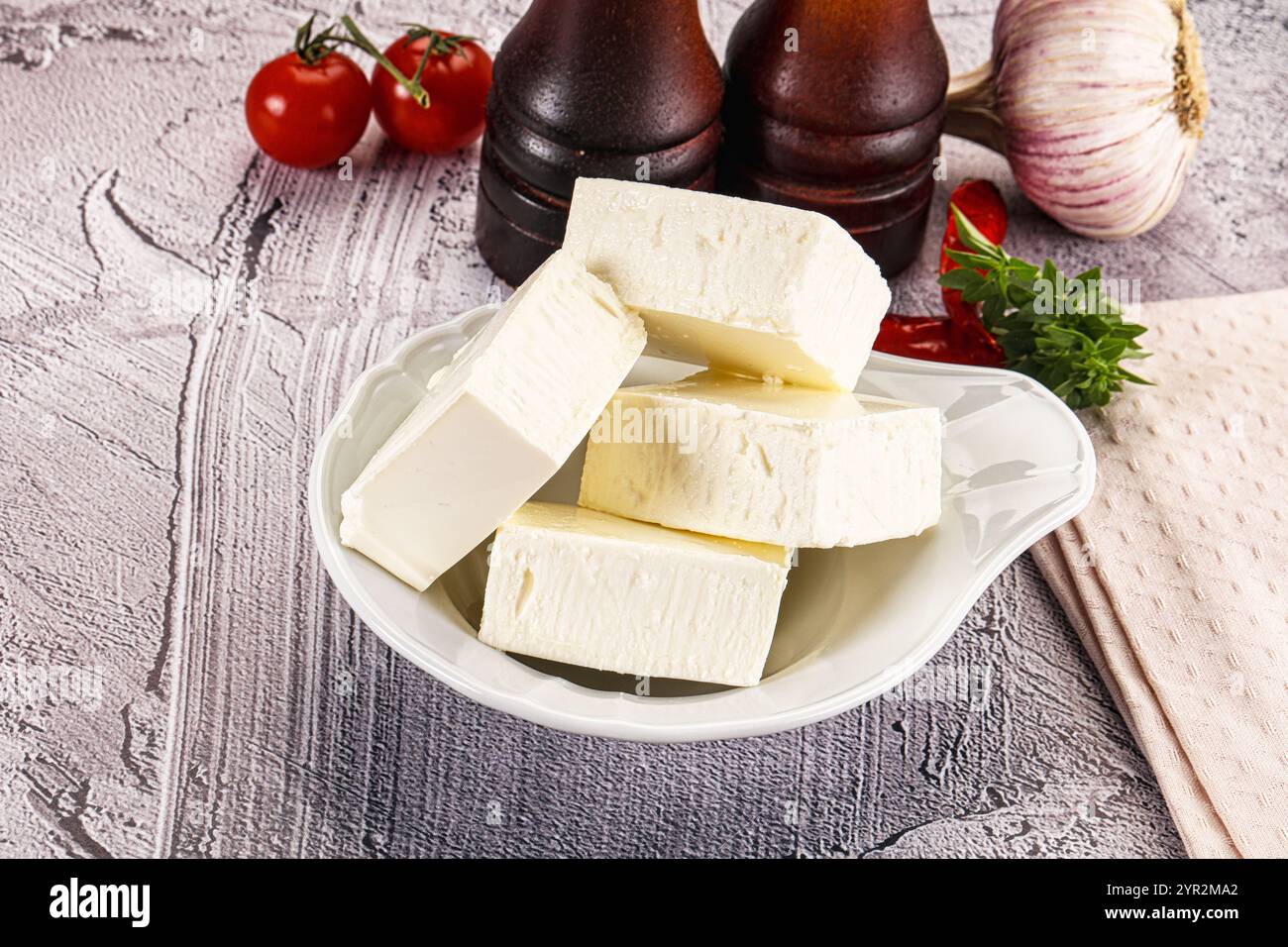 Greek traditional cuisine - Feta cheese bricks Stock Photo - Alamy