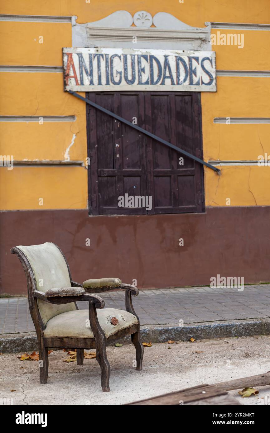 Rustic Wooden Chair Outside an Antique Store Stock Photo - Alamy