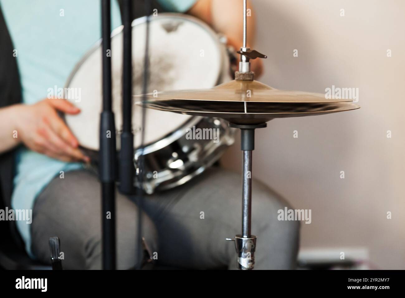 Drummer plays a snare drum with hands. Live music background photo ...