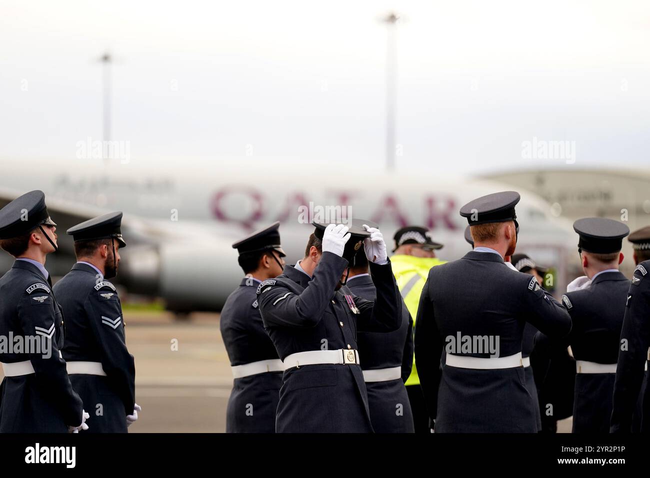 Members of the RAF await the arrival of Emir of Qatar Sheikh Tamim bin Hamad Al Thani, and ...