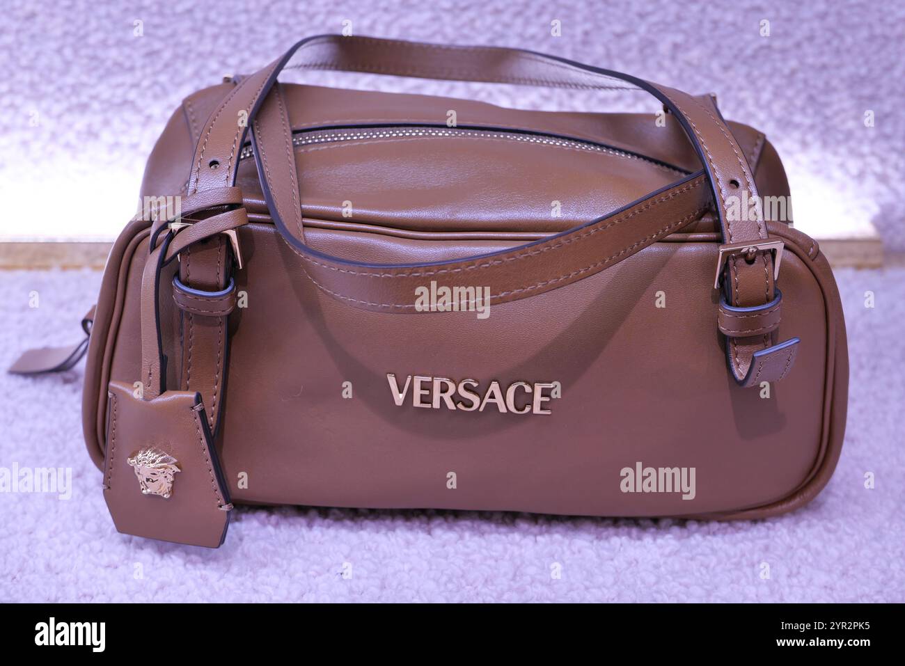 VERSACE BAG FOR WOMAN ON DISPLAY INSIDE THE FASHION STORE Stock Photo ...