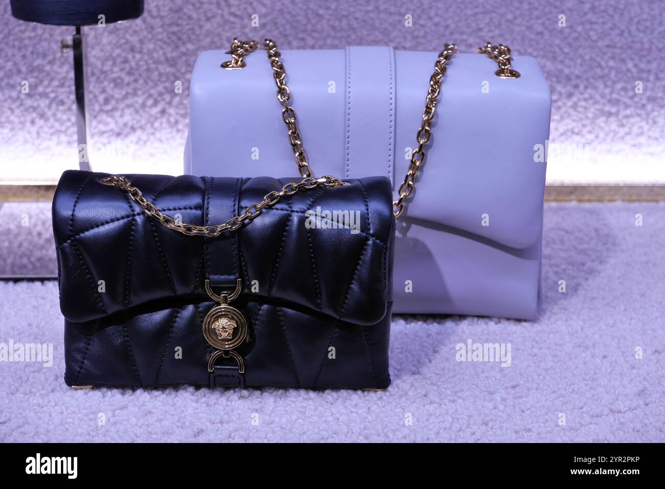 VERSACE BAG FOR WOMAN ON DISPLAY INSIDE THE FASHION BOUTIQUE Stock ...