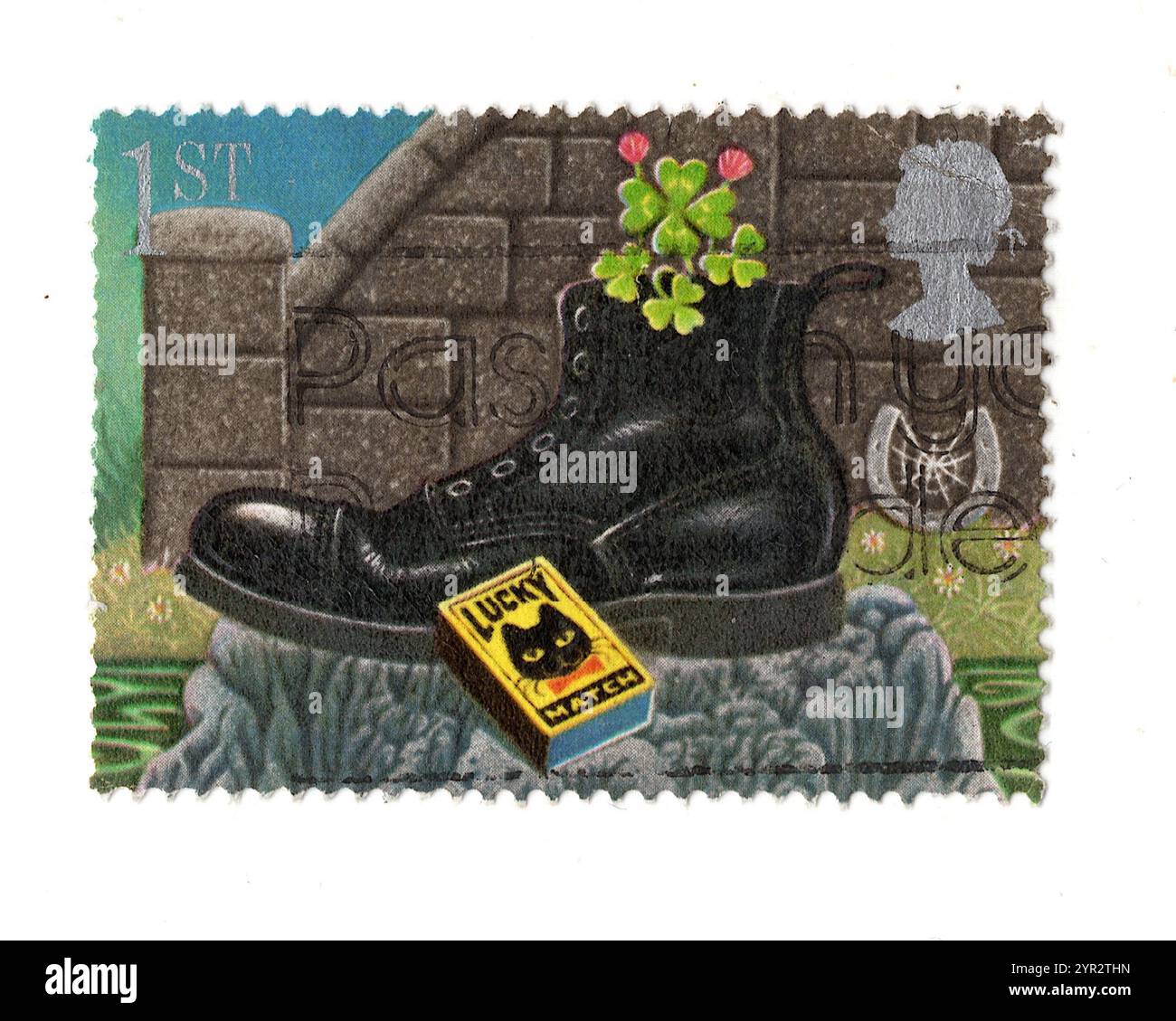 A vintage postage stamp from Great Britain featuring a Good Luck symbol ...