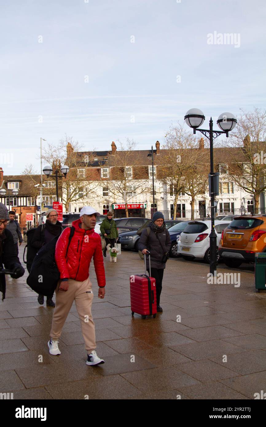 People rushing to catch the train in Norwich Stock Photo - Alamy