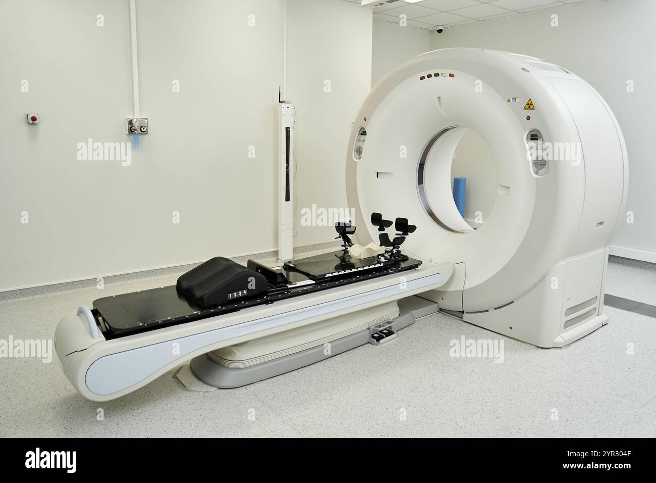 Cutting-edge MRI machine stands ready in a pristine hospital ...