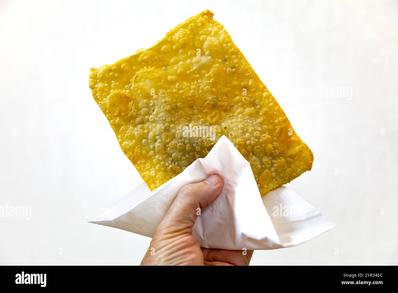 Traditional Brazilian fried pastry stuffed with ground beef. "Pastel de ...