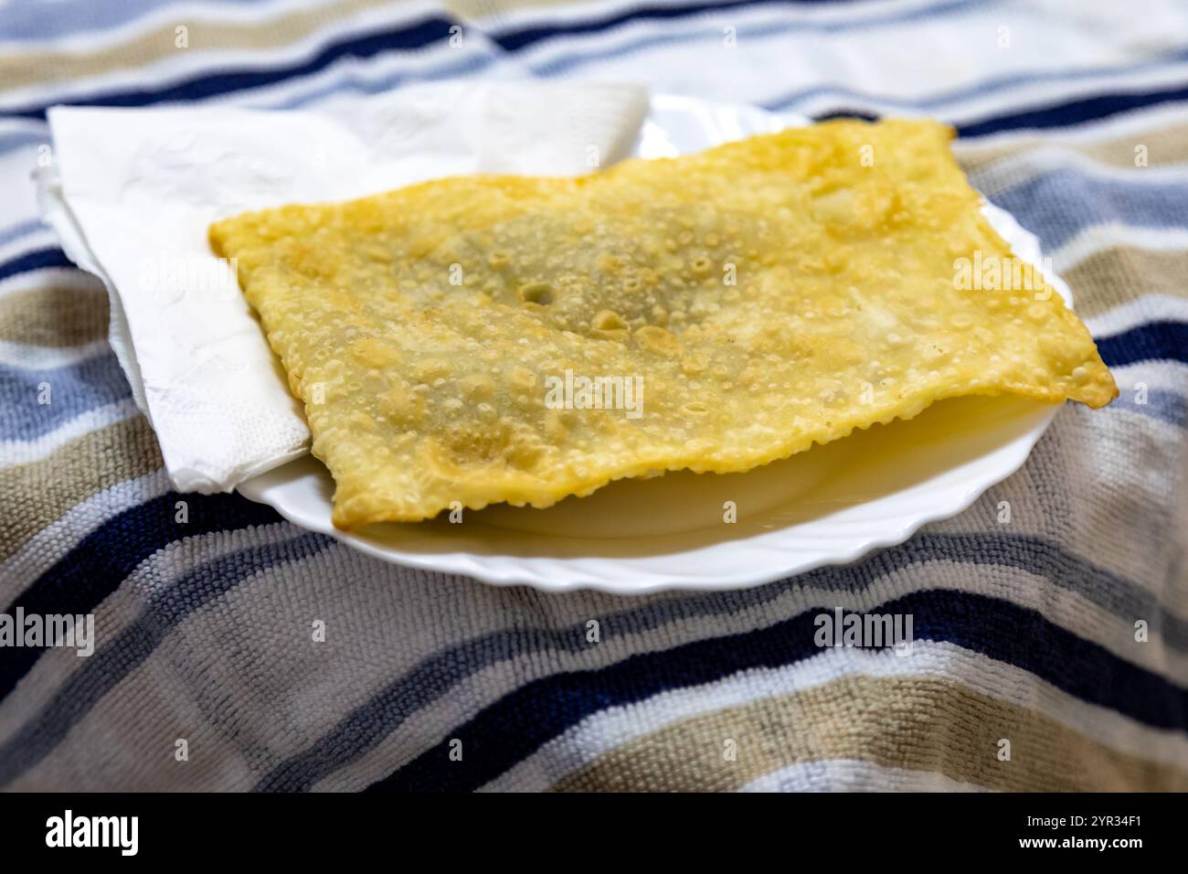 Traditional Brazilian fried pastry stuffed with ground beef. "Pastel de ...