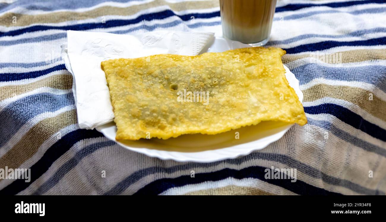 Traditional Brazilian fried pastry stuffed with ground beef. "Pastel de ...