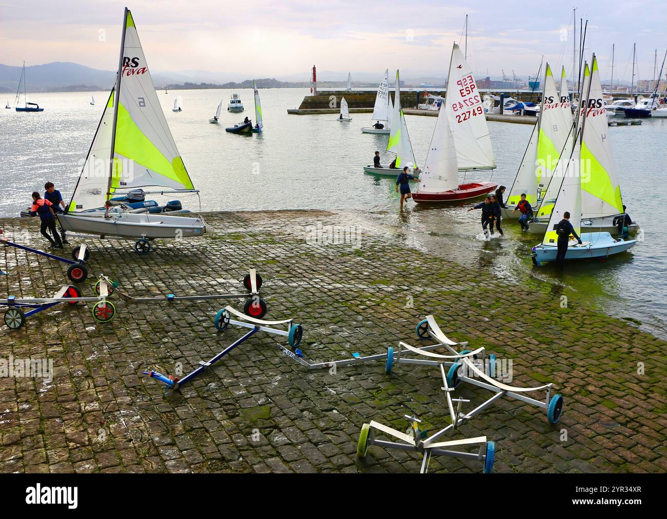 Small dinghies returning to the sailing school Santander Bay Cantabria ...