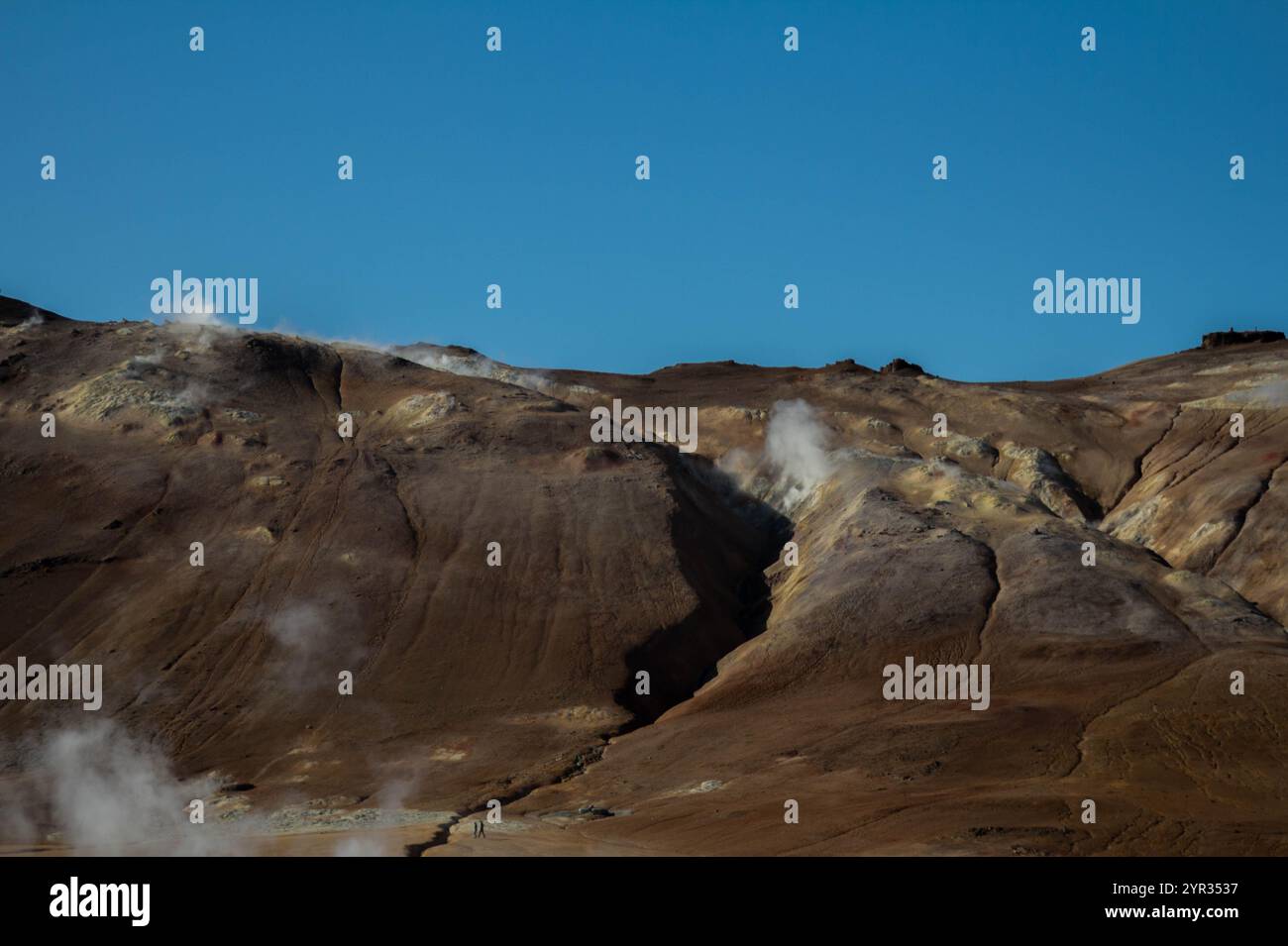A powerful eruption from a geyser at Geyser Park in Iceland, showcasing ...