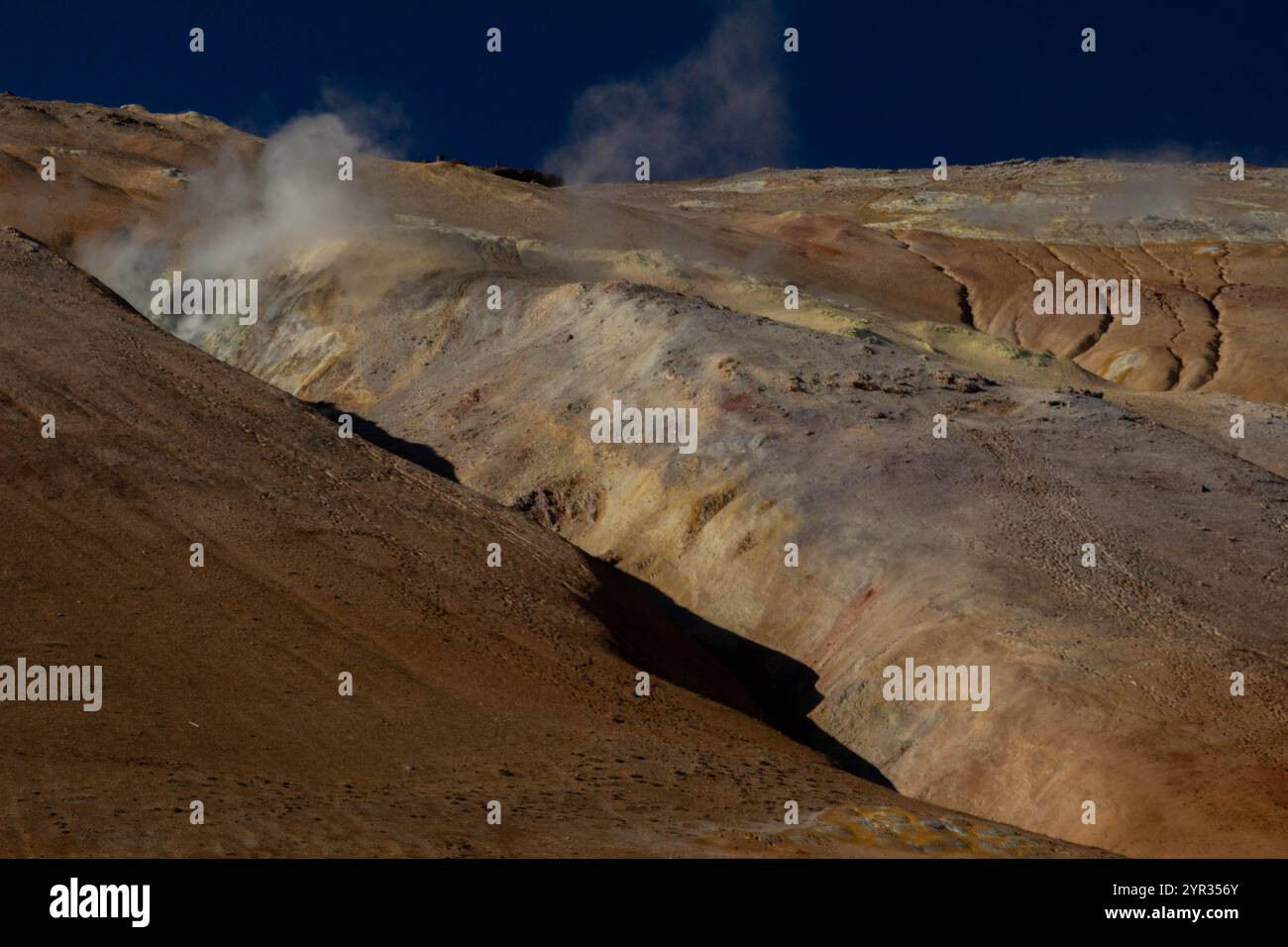 A powerful eruption from a geyser at Geyser Park in Iceland, showcasing ...