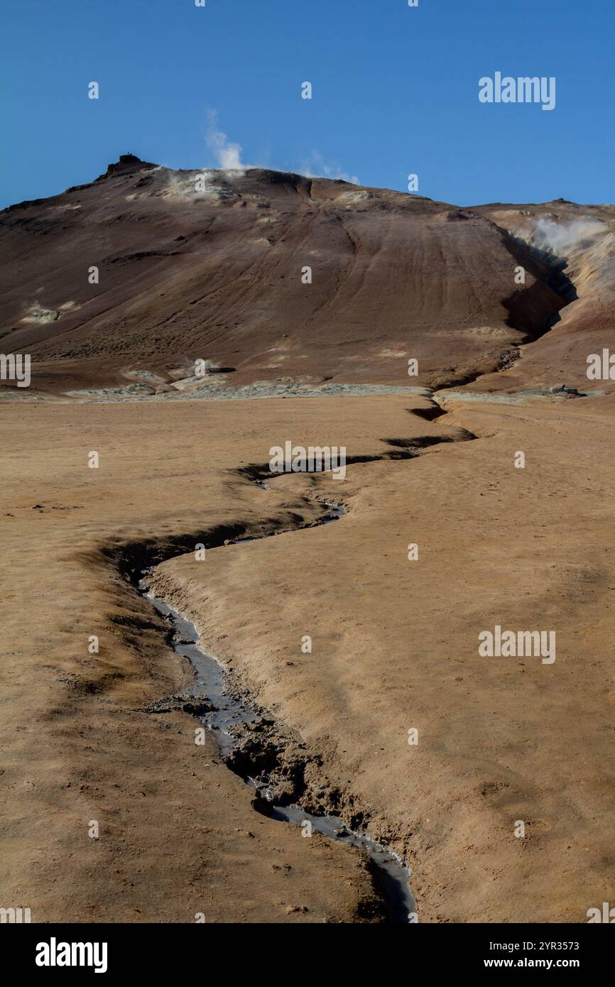 A powerful eruption from a geyser at Geyser Park in Iceland, showcasing ...