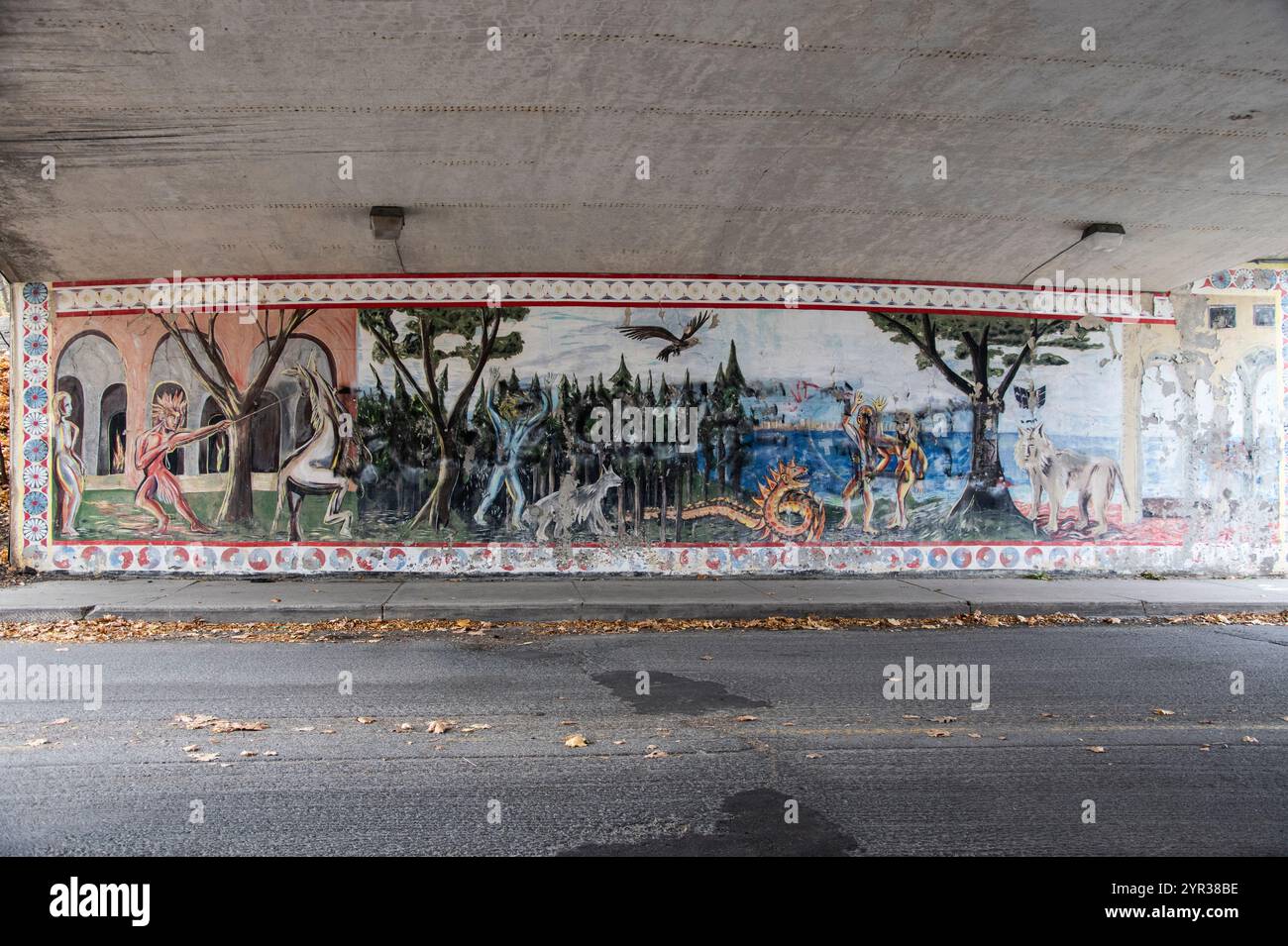 People and mythical creatures mural on the underpass on Wellesley ...