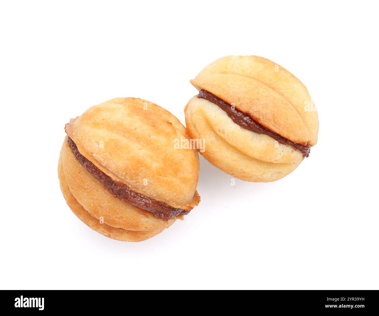 Sweet walnut shaped cookies with boiled condensed milk on white ...