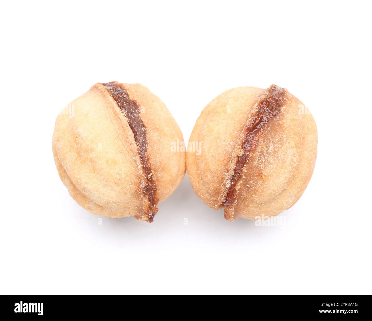 Sweet walnut shaped cookies with boiled condensed milk on white ...