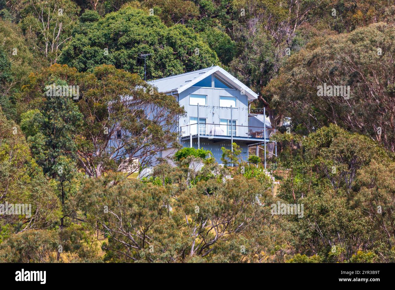 Photograph of a two storey house in a very remote location on the side ...