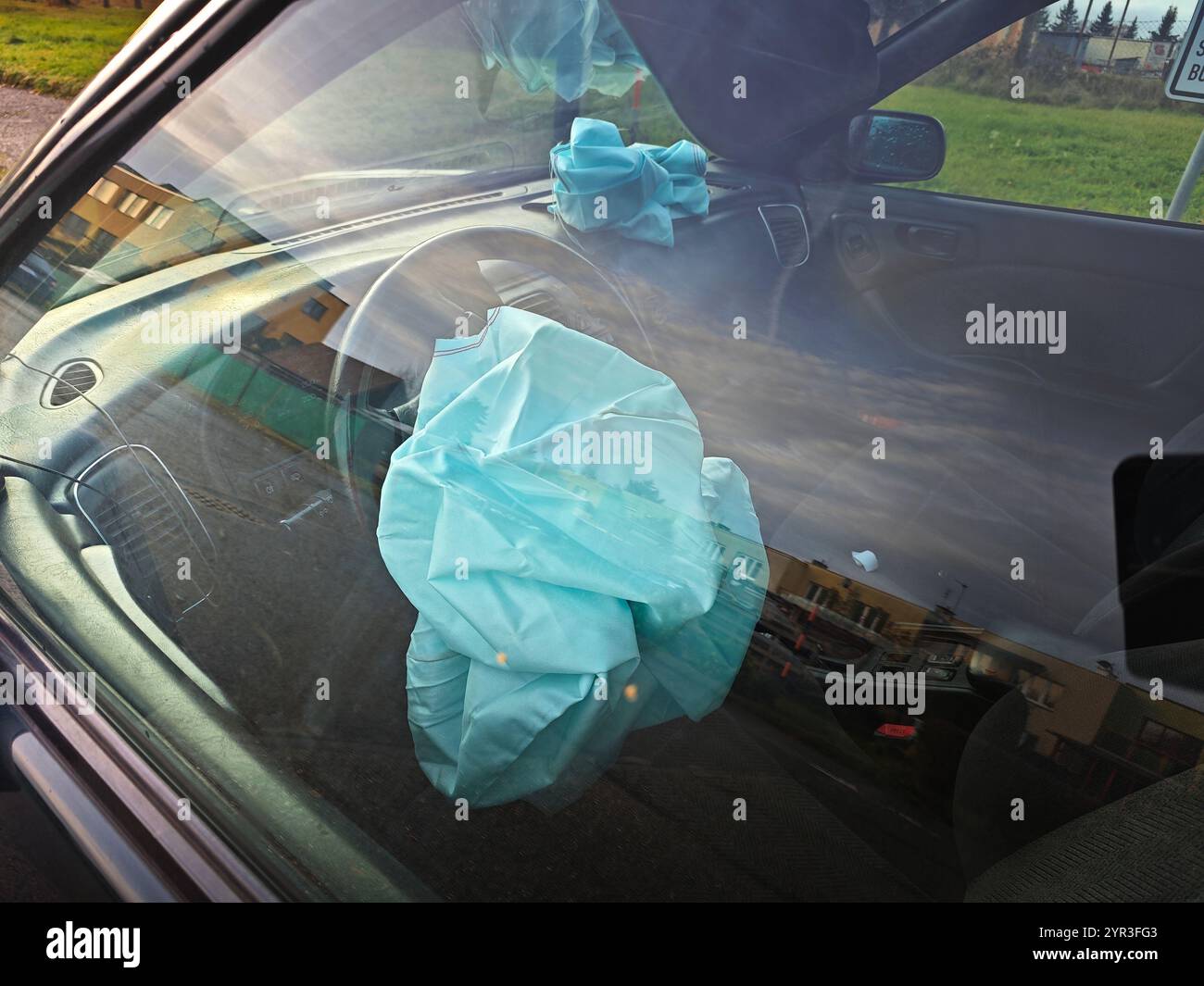 Interior of a automobile involved in a front crash with a deployed ...