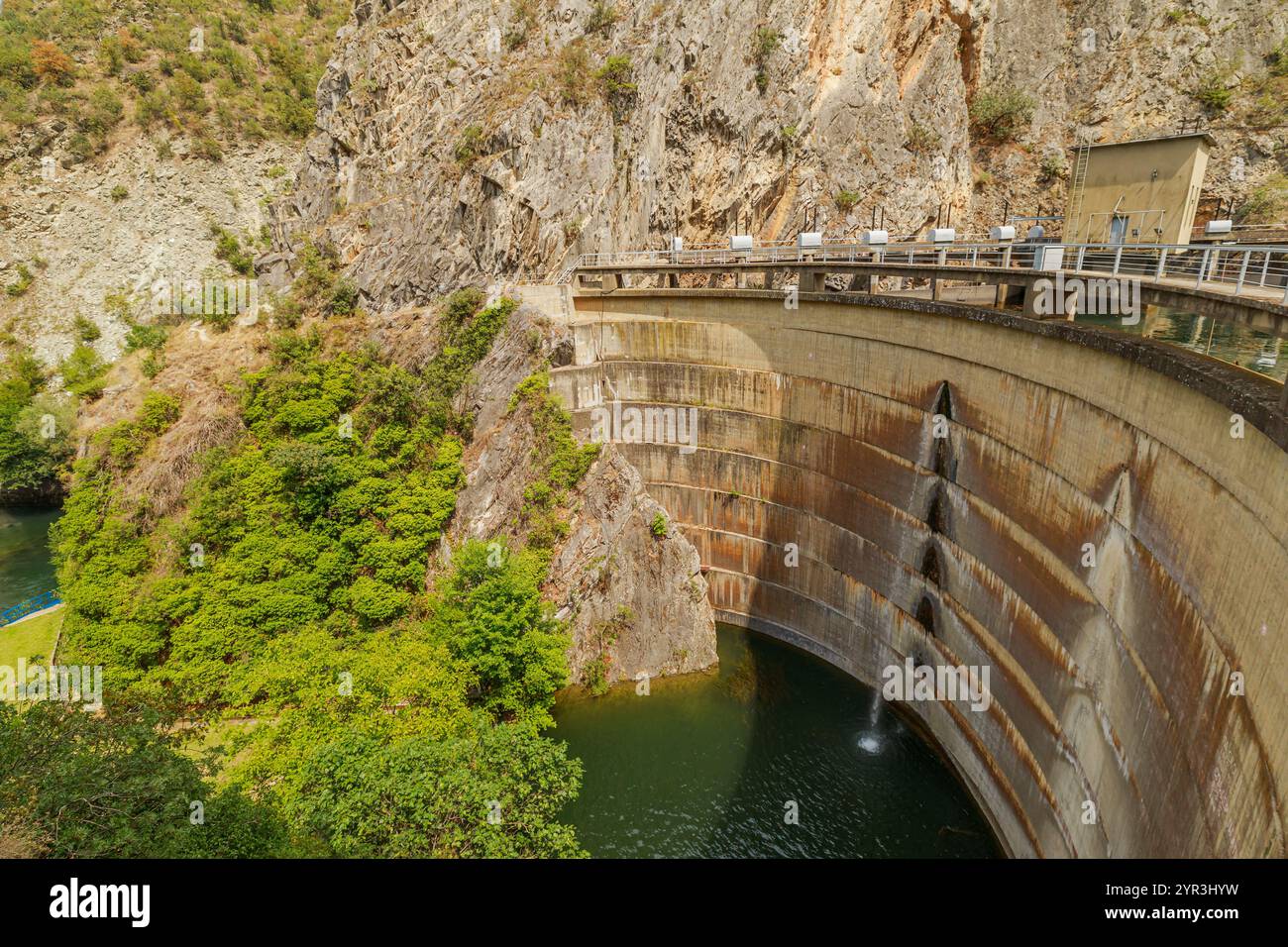 Water trickles down the curved face of the Matka dam, a concrete marvel ...
