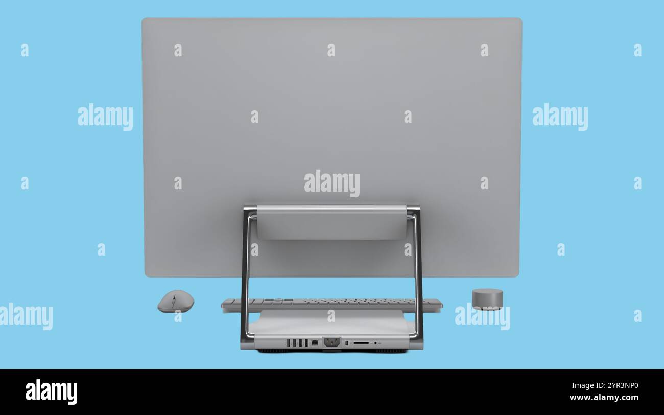 A sleek computer setup featuring a monitor, keyboard, mouse, and a ...