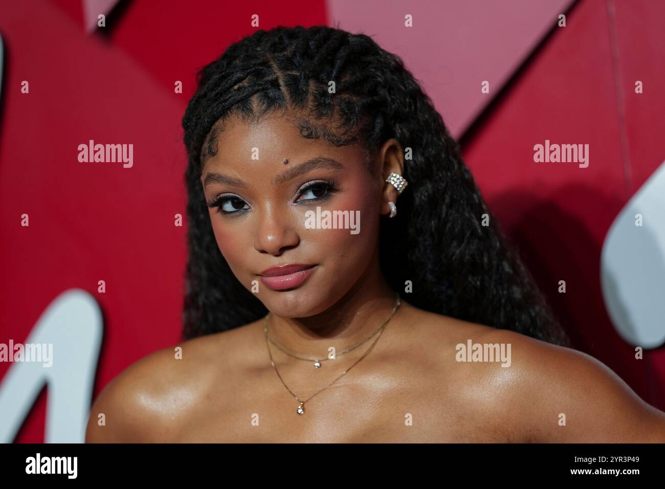 Halle Bailey poses for photographers upon arrival at the The Fashion ...