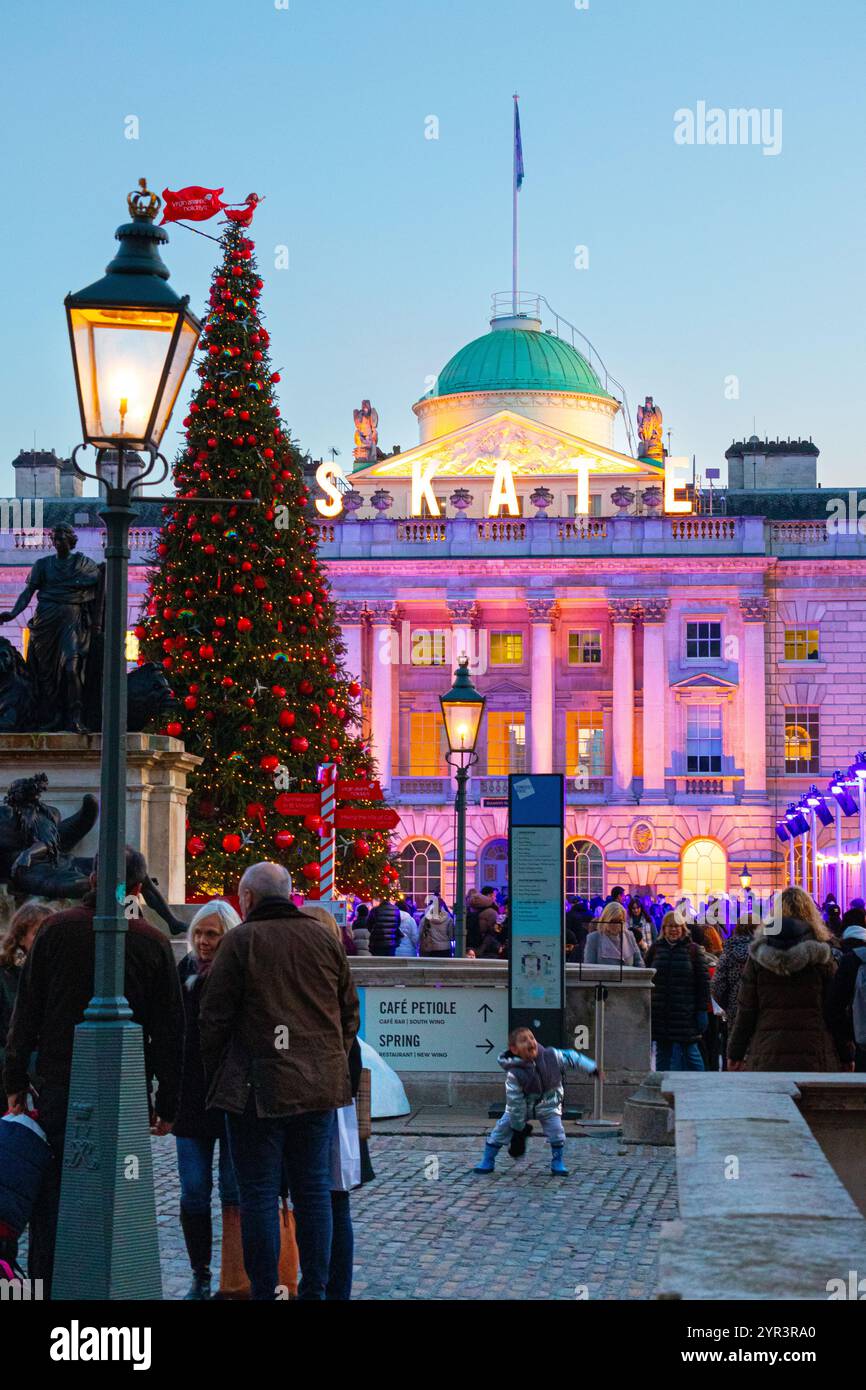 Winter early evening Christmas time fun at ice skating rink Somerset ...