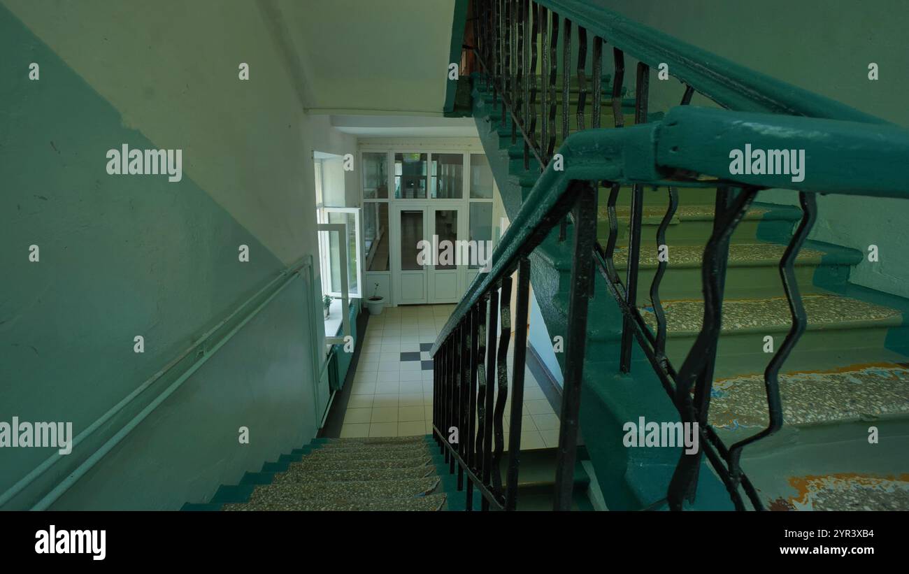 Empty school building staircase on the final day, stirring up memories ...