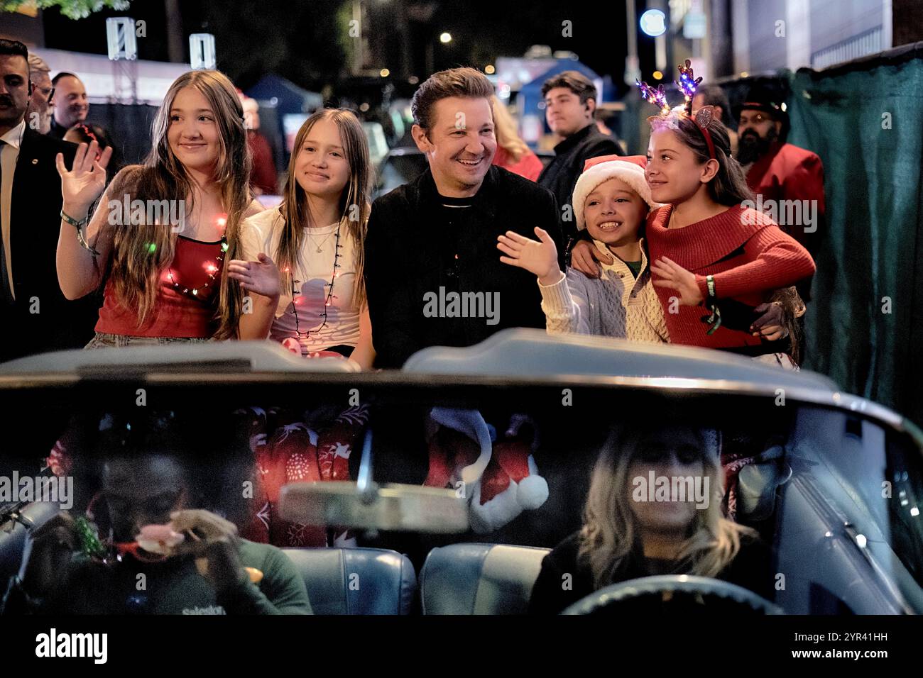 Actor Jeremy Renner joined by his daughter Ava, second from left with ...