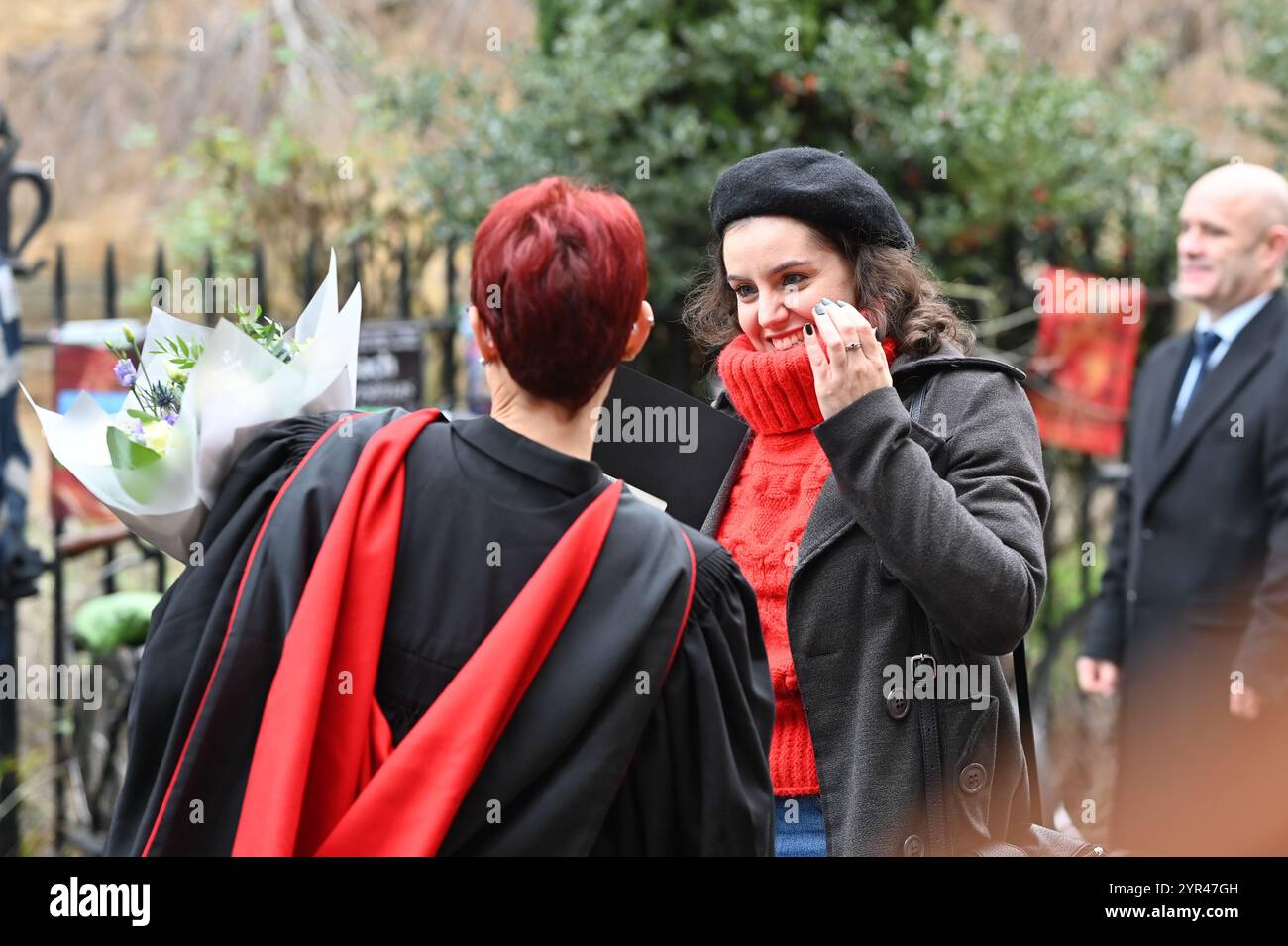 Cambridge England, 30 November 2024,UK. Graduation student greeted by ...