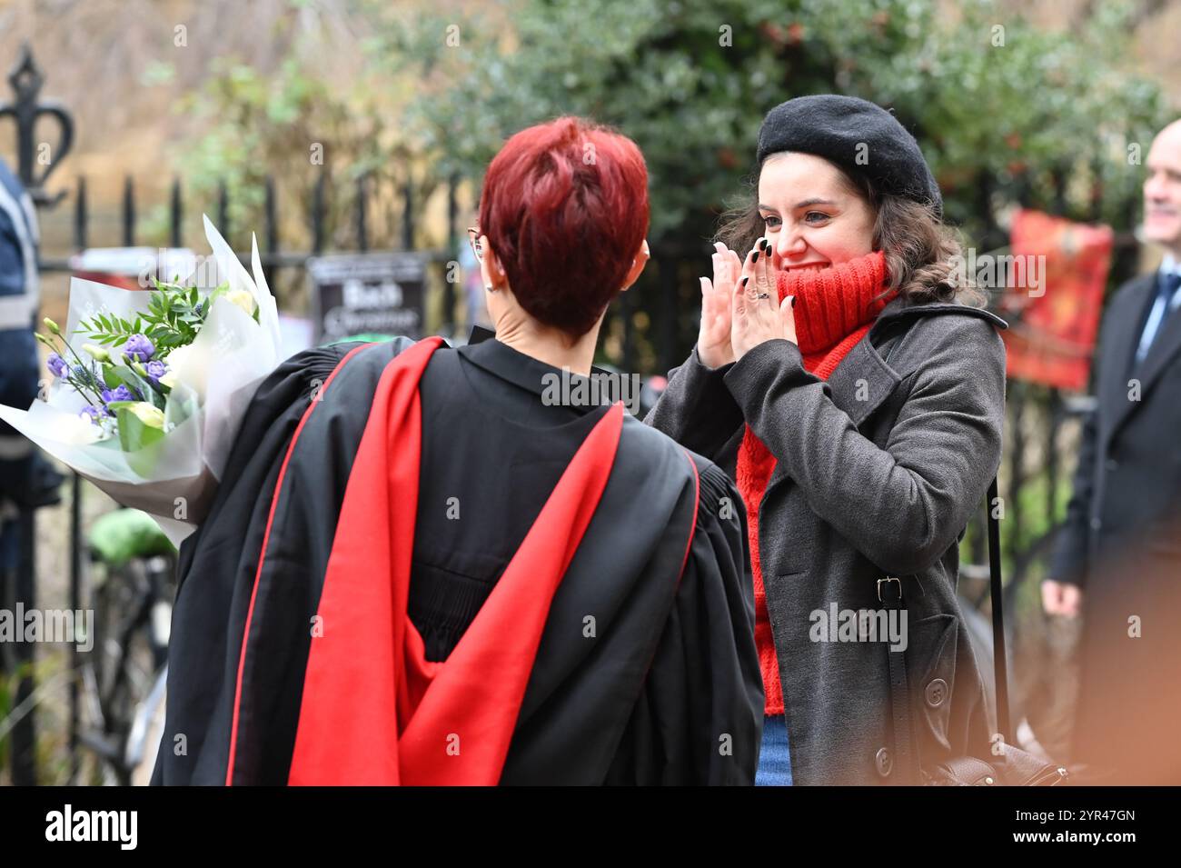 Cambridge England, 30 November 2024,UK. Graduation student greeted by ...