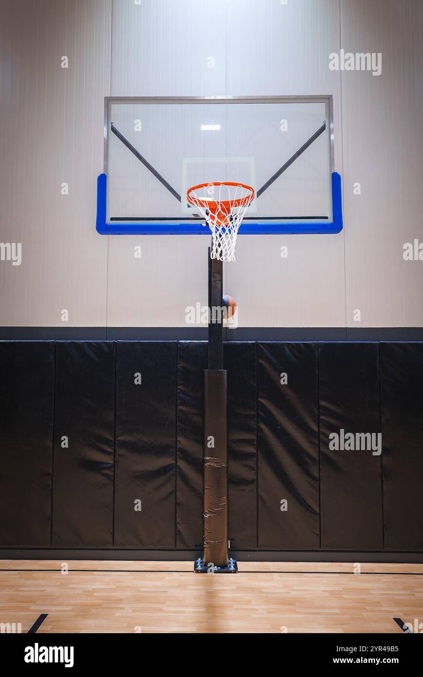 Modern Indoor Basketball Court with Blue Backboard and Wooden Floor ...