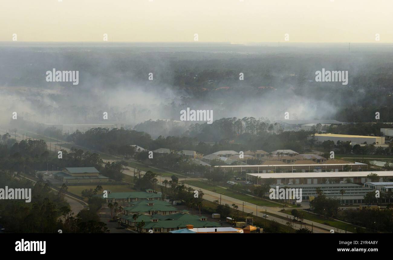Aerial view of strong wildfire burning severely in North Port city ...
