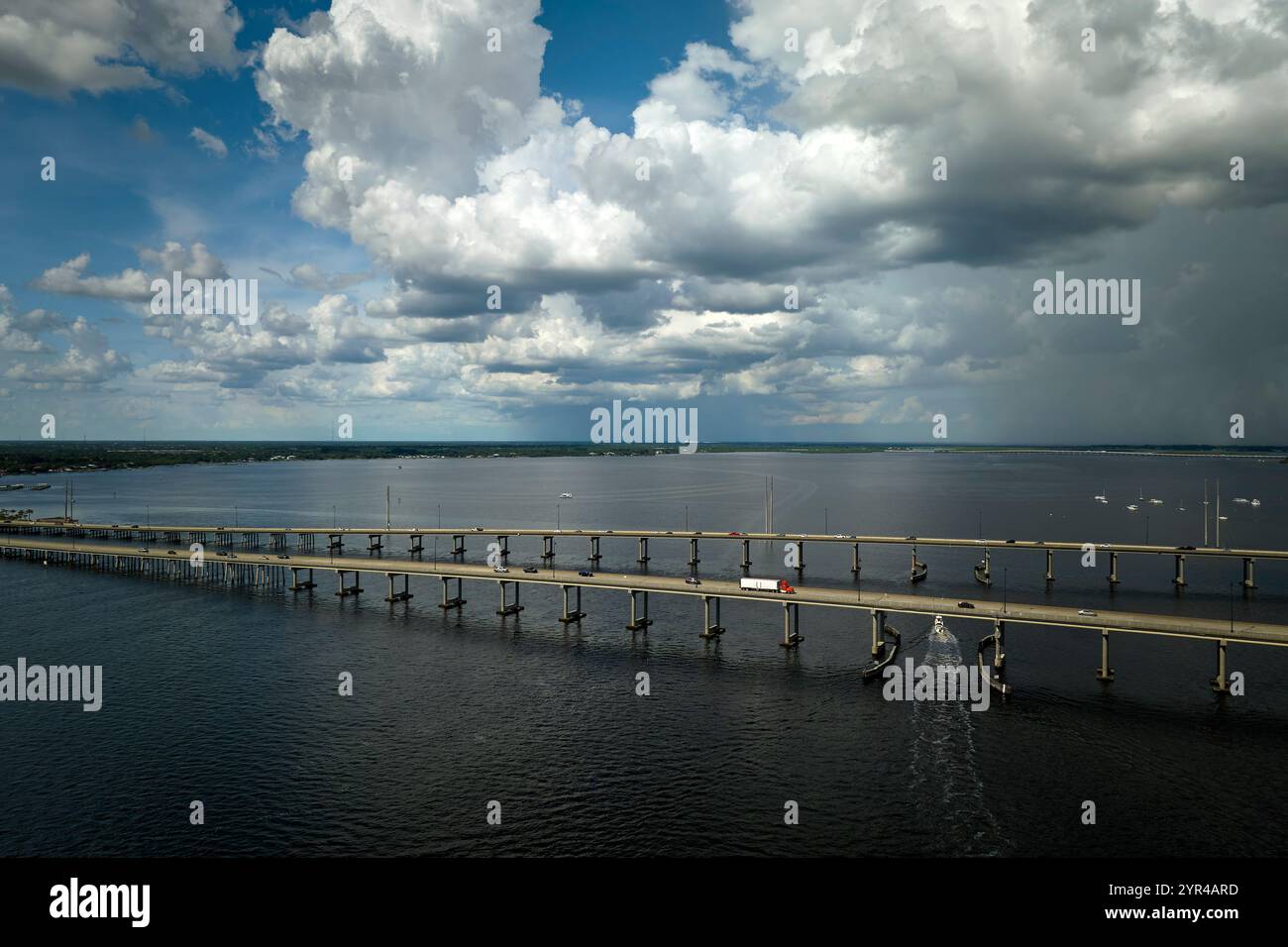 Barron Collier Bridge and Gilchrist Bridge in Florida with moving ...