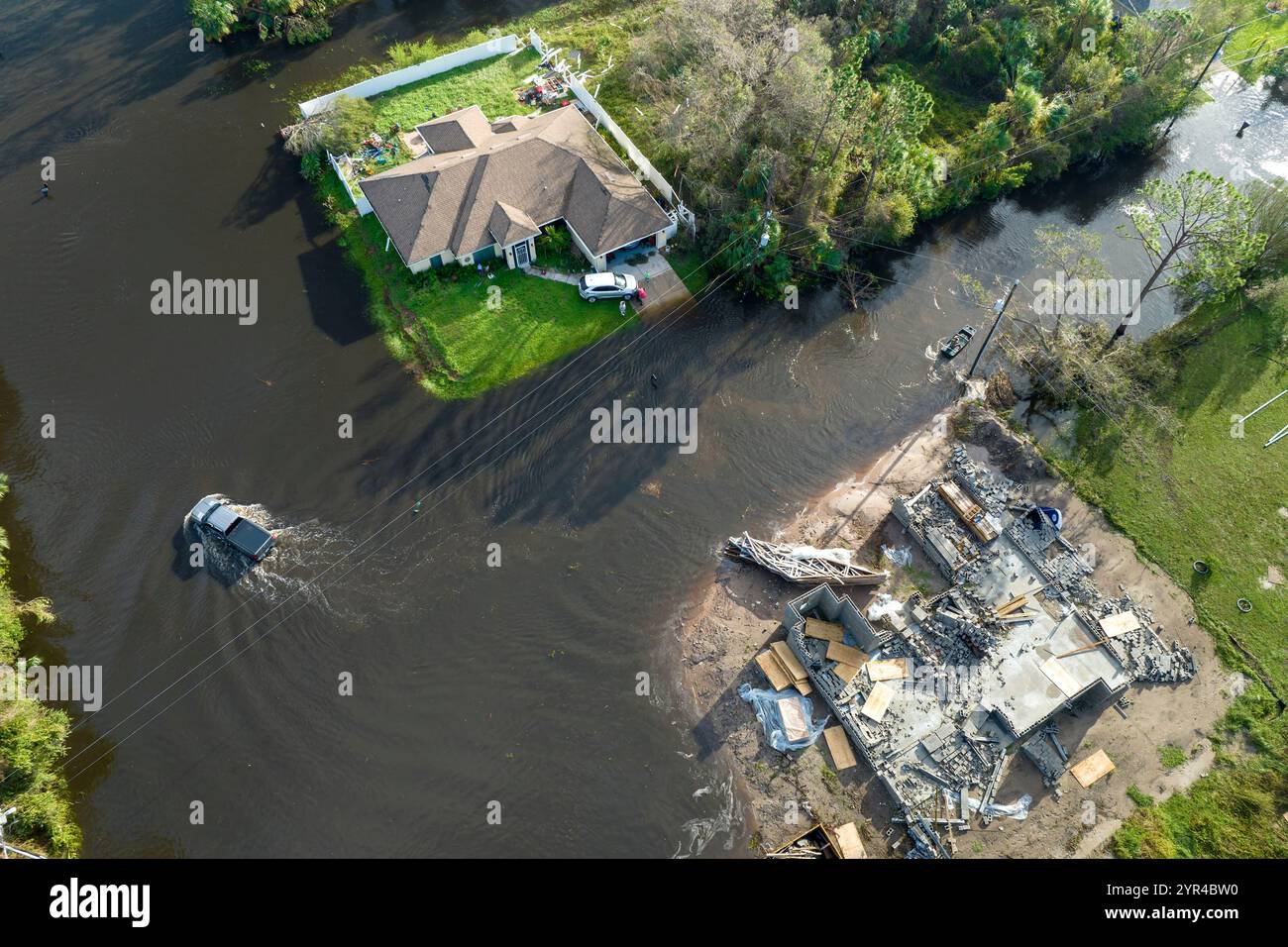 Flooded houses by hurricane rainfall in Florida residential area ...