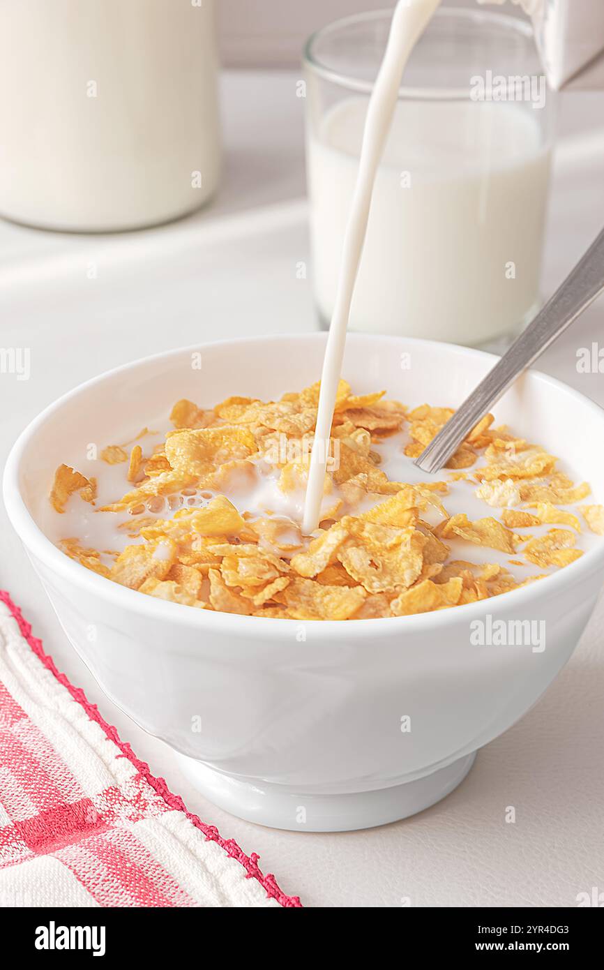 Pouring cereals milk on kitchen hi-res stock photography and images - Alamy