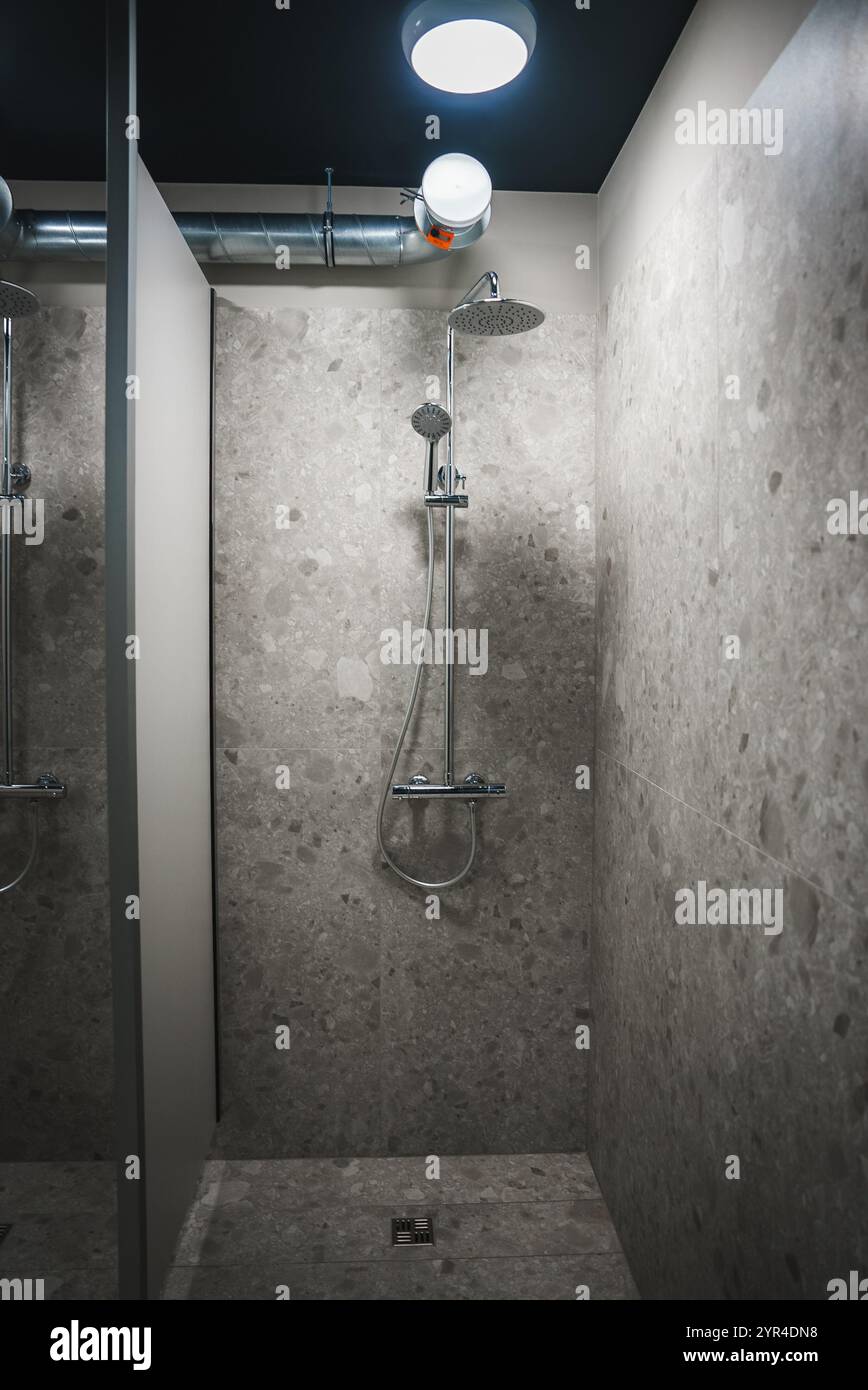 Modern Shower Stall with Rainfall Showerhead in Sports Complex Stock ...