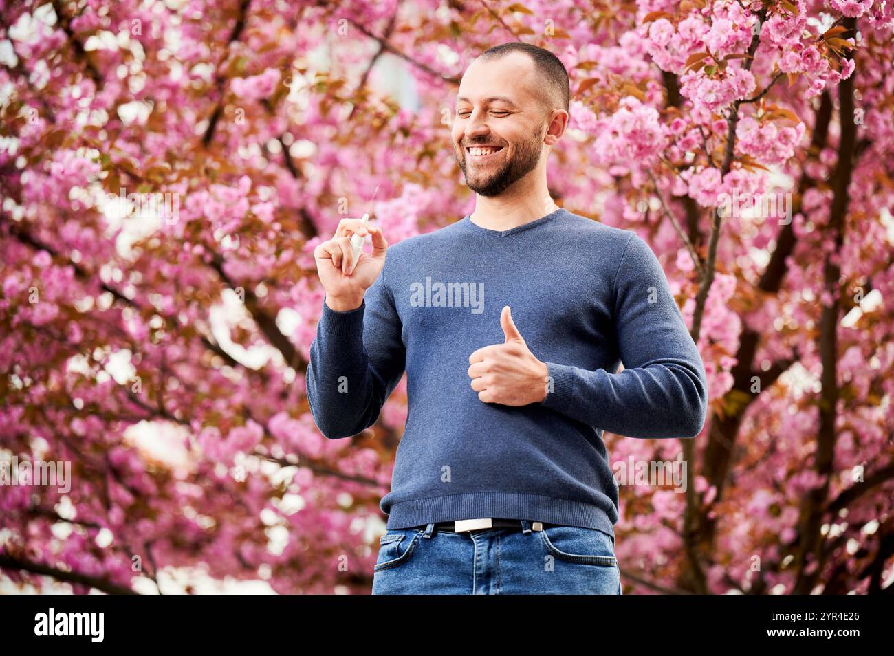 Man allergic using medical nasal drops, suffering from seasonal allergy ...