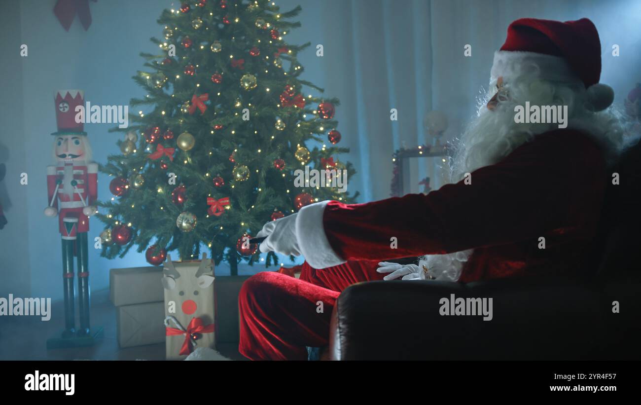 Santa watching tv hi-res stock photography and images - Alamy