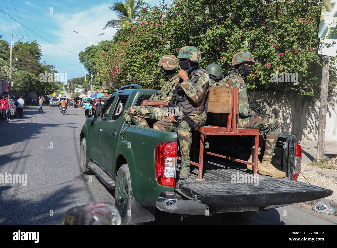 Soldiers patrol a street in Port-au-Prince, Haiti, Monday, Dec. 2, 2024 ...