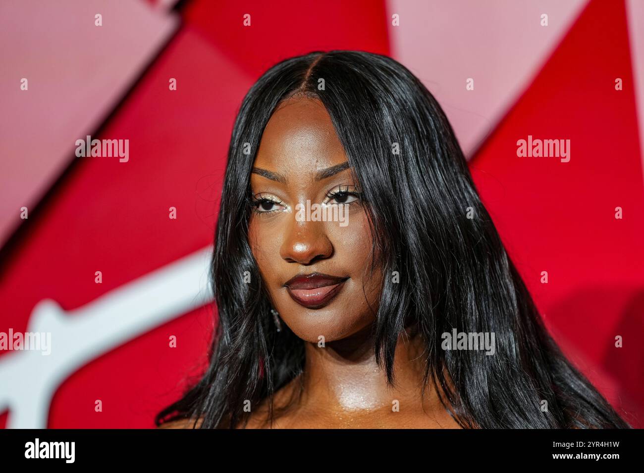 Tems poses for photographers upon arrival at the The Fashion Awards ...
