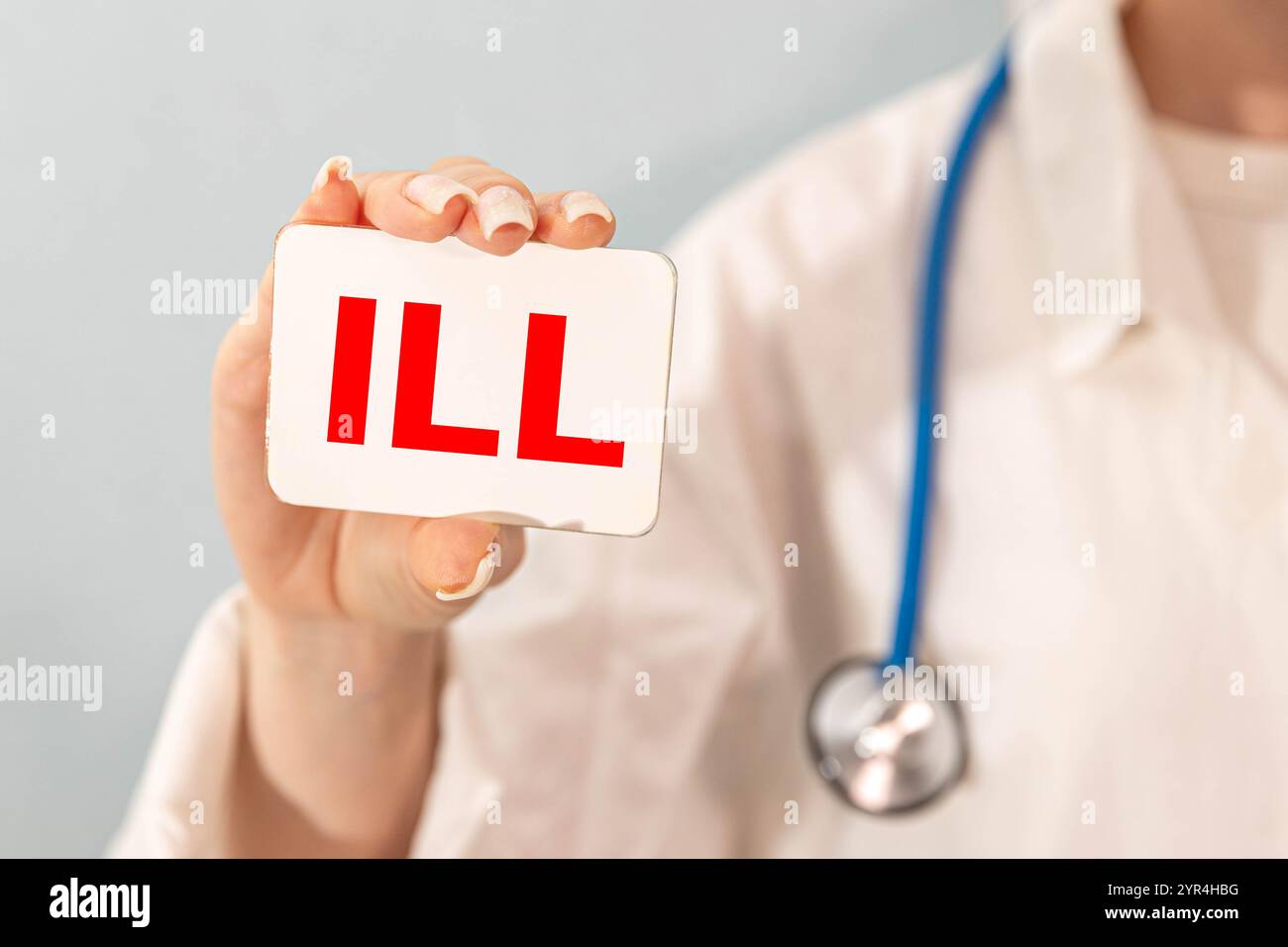 Doctor holding card help hi-res stock photography and images - Alamy
