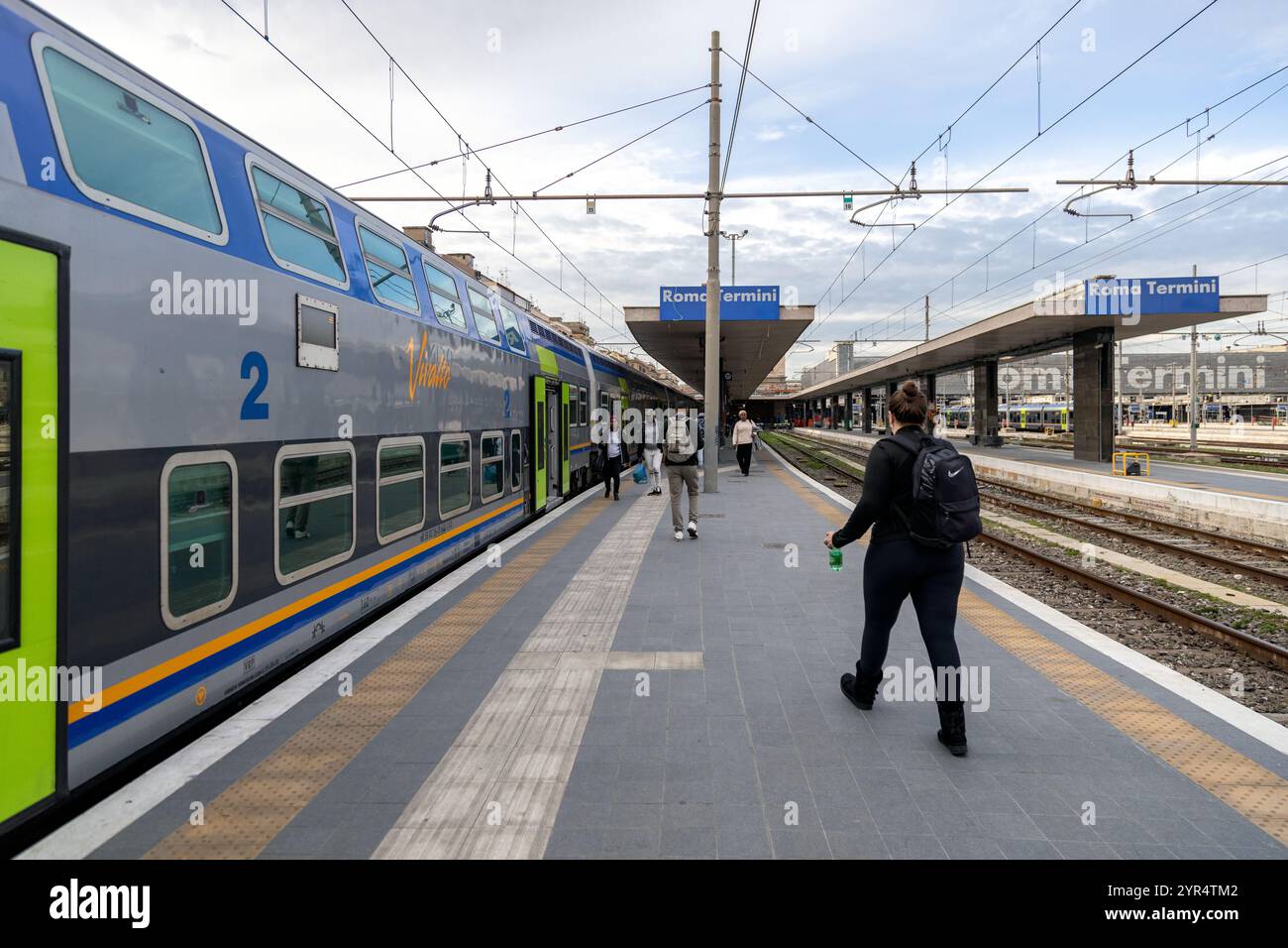Rome, Italy - Nov 13th, 2024: Passengers walk along the platform at ...