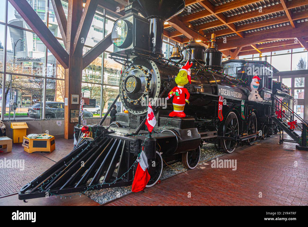 Heritage locomotive 374 in Christmas attire at the Yaletown Roundhouse ...