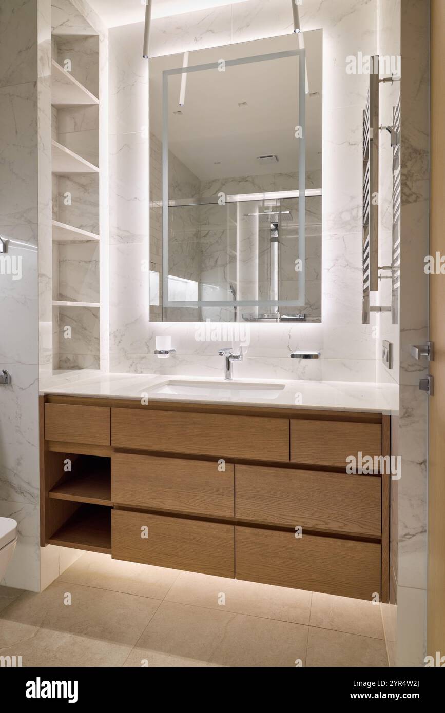 Explore modern bathroom designs with elegant features, stylish lighting ...