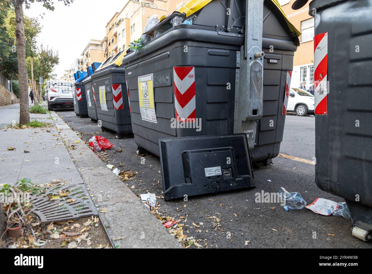 Rome, Italy - Nov 14th, 2024: Overflowing garbage bins with discarded ...