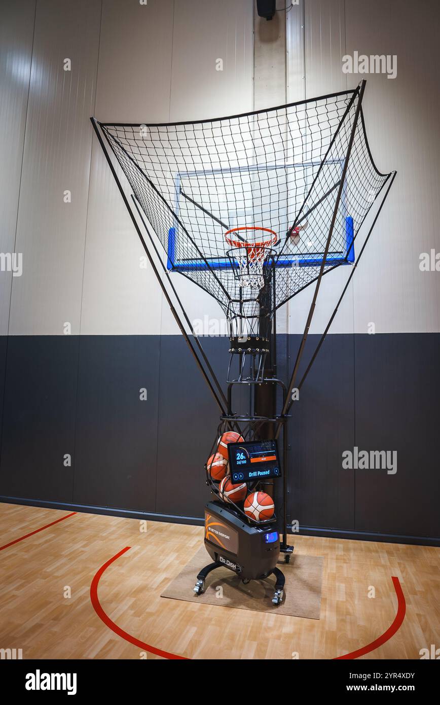 Indoor Basketball Court with Modern Shooting Machine and Polished Floor ...