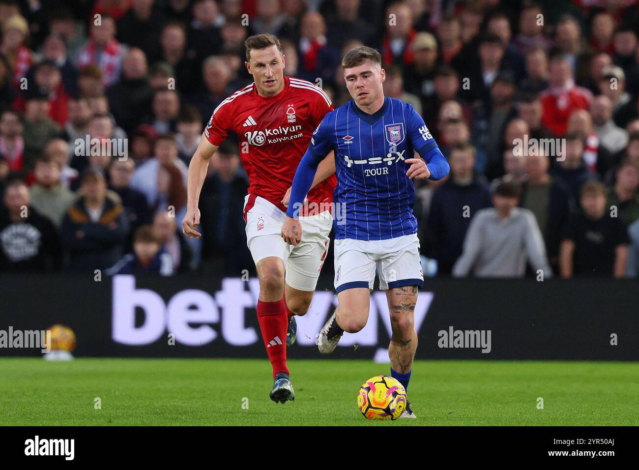 Leif Davis of Ipswich Town and Chris Wood of Nottingham Forest ...
