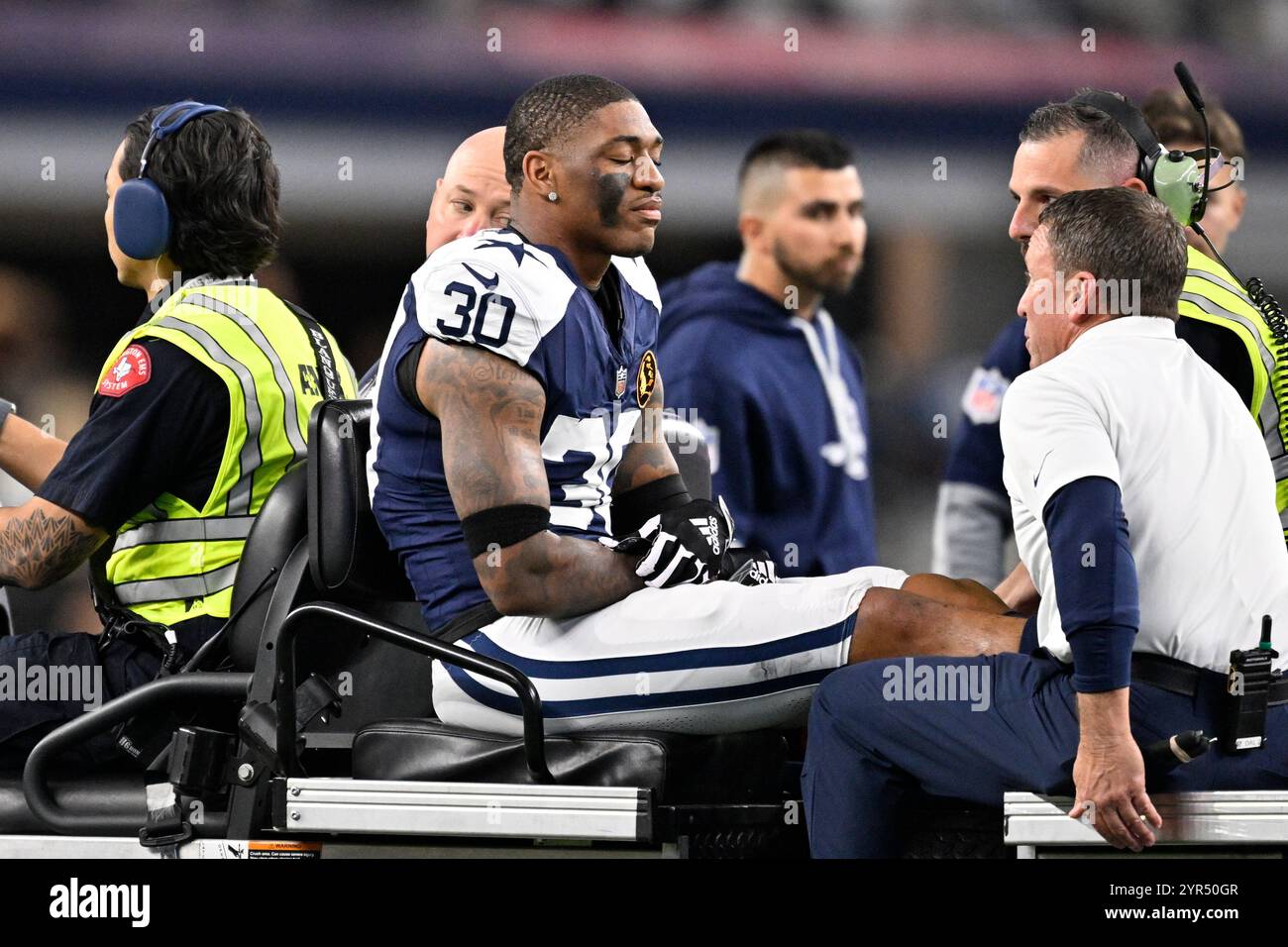 Dallas Cowboys safety Juanyeh Thomas (30) reacts after an injury during ...
