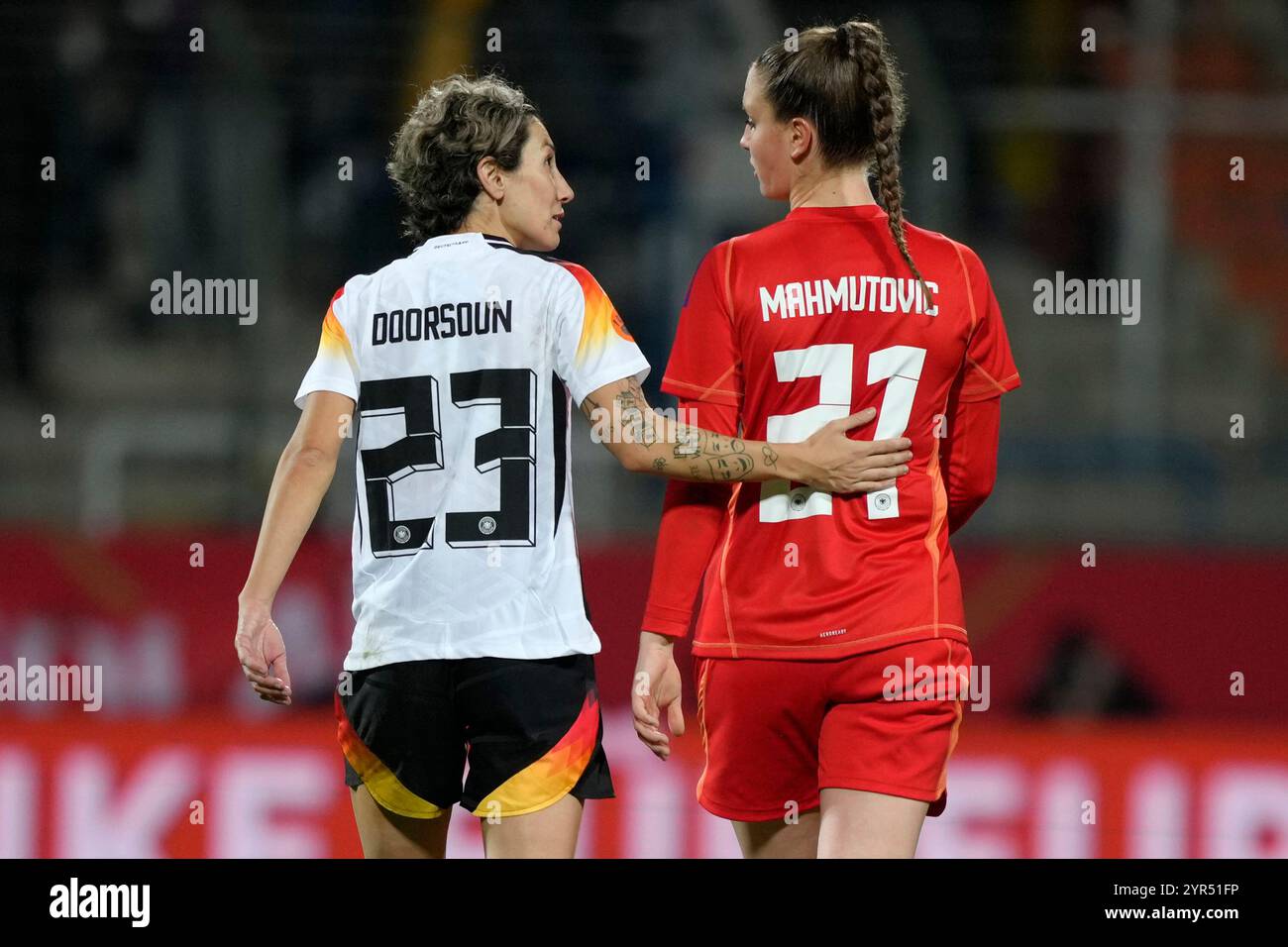 Germany's Sara Doorsoun, left, comforts Germany's goalkeeper Ena ...