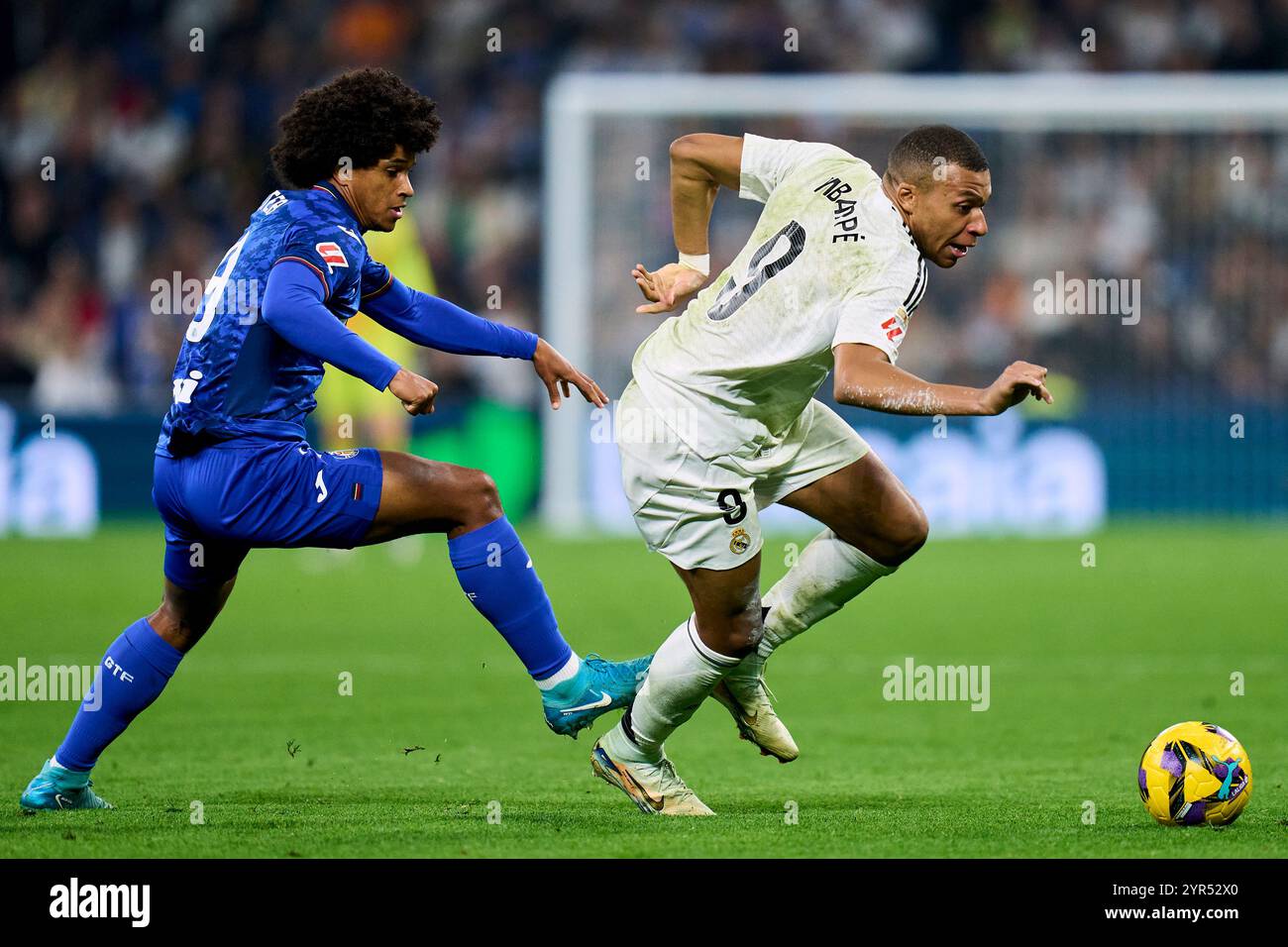 Madrid, Spain. 01st Dec, 2024. Peter Federico of Getafe CF and Kylian ...